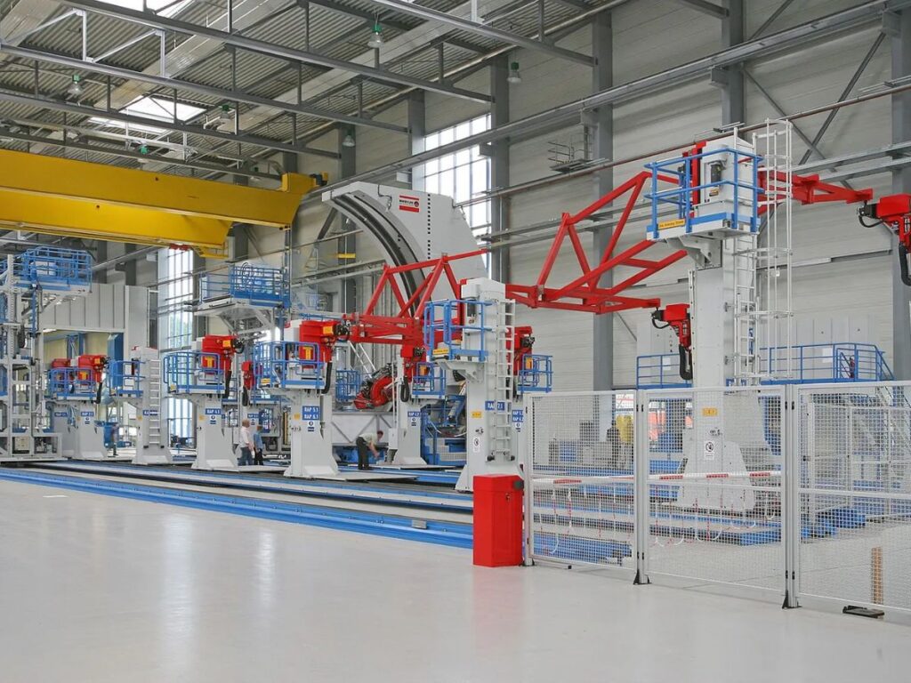 A Beginner’s Guide To Assembly Lines In Manufacturing | Conveyor Roller ...